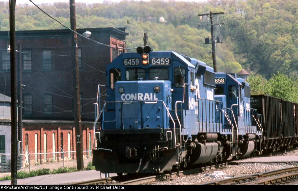 CR SD-40-2 # 6459 heads a northbound hopper train at CP Ham
